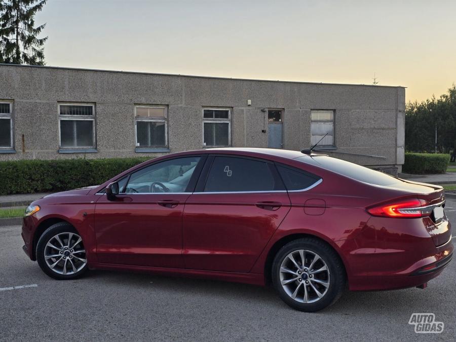 Red Ford Fusion 2017 in Siauliai, with an engine capacity of 1.50 L and mileage of 281 thousand km for 5750 €, photo 16 on AUTOMOTO.COM.LV