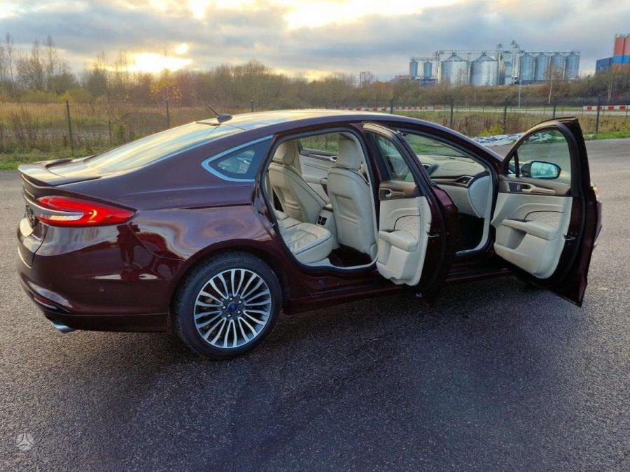 Red Ford Fusion 2018 in Siauliai, with an engine capacity of 1.97 L and mileage of 78 thousand km for 14000 €, photo 16 on AUTOMOTO.COM.LV