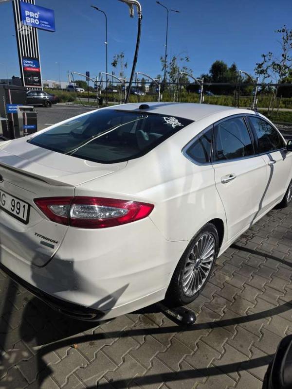 White Ford Fusion 2013 in Vilnius, with an engine capacity of 2.00 L and mileage of 112 thousand km for 4500 €, photo 4 on AUTOMOTO.COM.LV