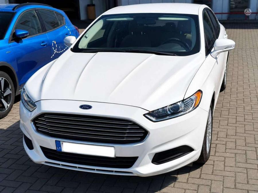 White Ford Fusion 2015 in Klaipeda, with an engine capacity of 2.00 L and mileage of 235 thousand km for 5700 €, photo 4 on AUTOMOTO.COM.LV