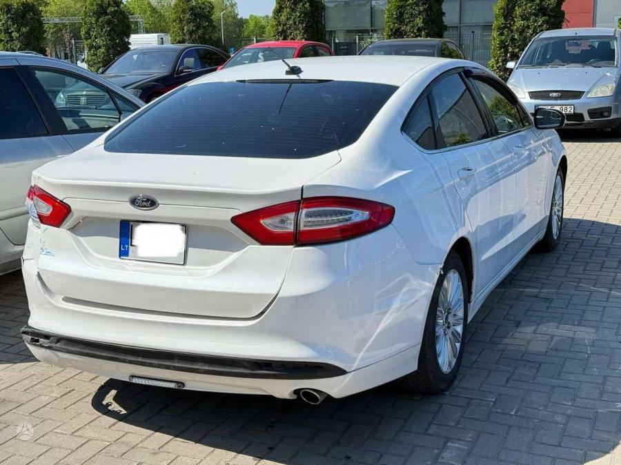 White Ford Fusion 2015 in Klaipeda, with an engine capacity of 2.00 L and mileage of 235 thousand km for 5700 €, photo 5 on AUTOMOTO.COM.LV