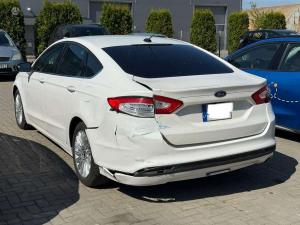 White Ford Fusion 2015 in Klaipeda, with an engine capacity of 2.00 L and mileage of 235 thousand km for 5700 €, photo 6 on AUTOMOTO.COM.LV