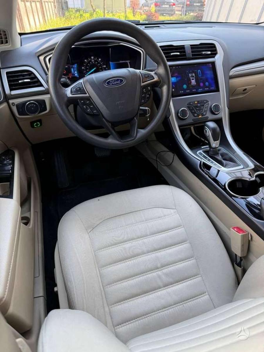 White Ford Fusion 2015 in Klaipeda, with an engine capacity of 2.00 L and mileage of 235 thousand km for 5700 €, photo 10 on AUTOMOTO.COM.LV