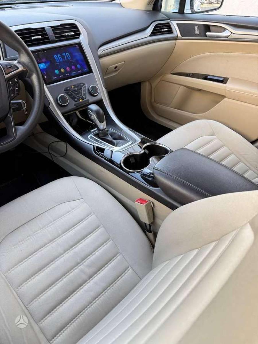 White Ford Fusion 2015 in Klaipeda, with an engine capacity of 2.00 L and mileage of 235 thousand km for 5700 €, photo 11 on AUTOMOTO.COM.LV