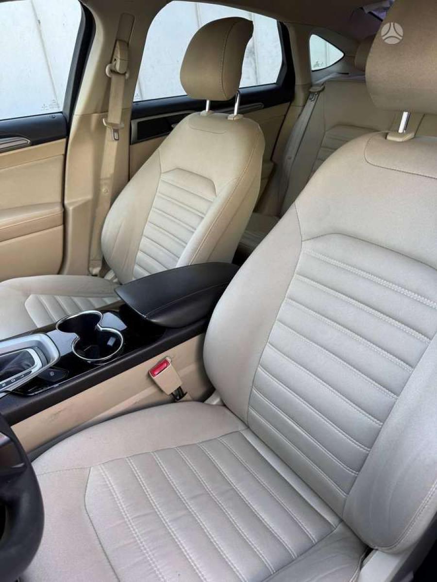 White Ford Fusion 2015 in Klaipeda, with an engine capacity of 2.00 L and mileage of 235 thousand km for 5700 €, photo 19 on AUTOMOTO.COM.LV