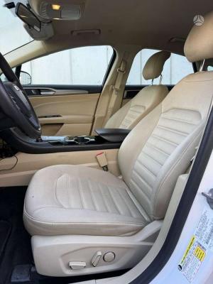 White Ford Fusion 2015 in Klaipeda, with an engine capacity of 2.00 L and mileage of 235 thousand km for 5700 €, photo 20 on AUTOMOTO.COM.LV