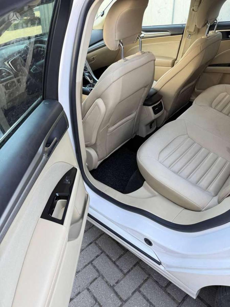 White Ford Fusion 2015 in Klaipeda, with an engine capacity of 2.00 L and mileage of 235 thousand km for 5700 €, photo 21 on AUTOMOTO.COM.LV