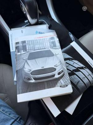 White Ford Fusion 2015 in Klaipeda, with an engine capacity of 2.00 L and mileage of 235 thousand km for 5700 €, photo 24 on AUTOMOTO.COM.LV