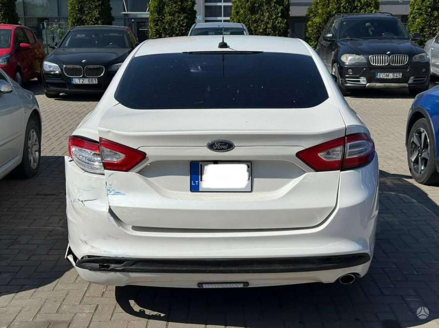 White Ford Fusion 2015 in Klaipeda, with an engine capacity of 2.00 L and mileage of 215 thousand km for 5700 €, photo 7 on AUTOMOTO.COM.LV