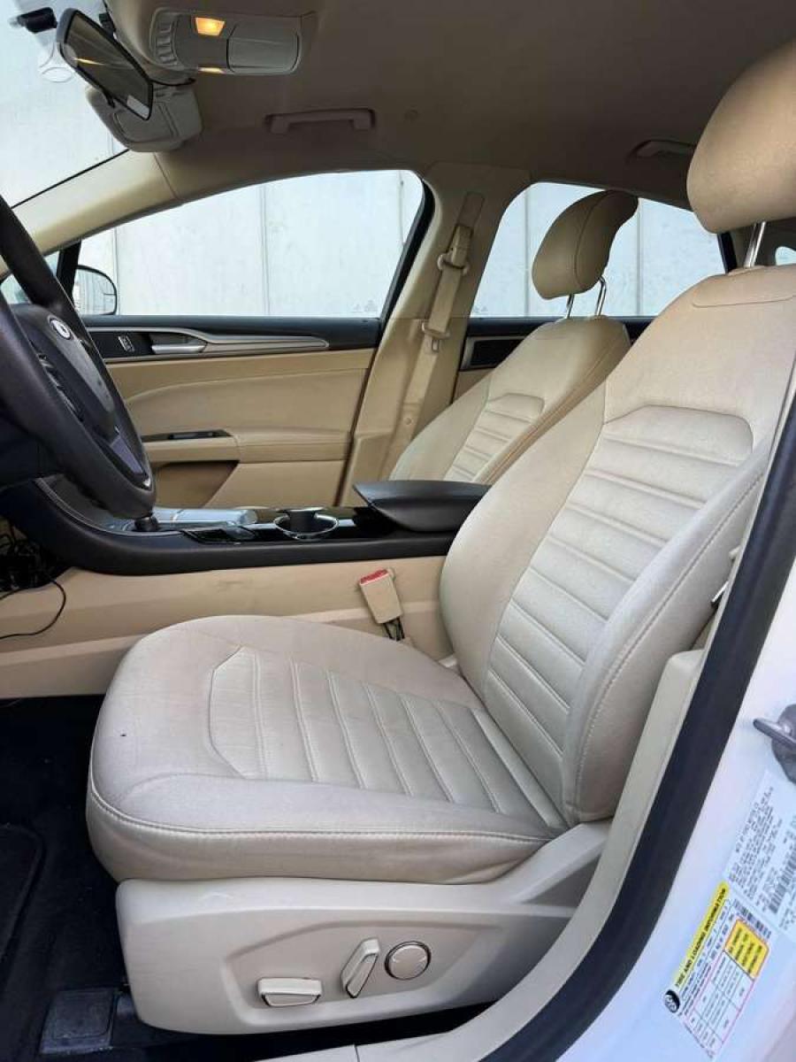 White Ford Fusion 2015 in Klaipeda, with an engine capacity of 2.00 L and mileage of 215 thousand km for 5700 €, photo 20 on AUTOMOTO.COM.LV