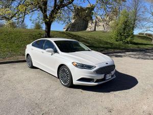 White Ford Fusion 2018 in Kaunas, with an engine capacity of 2.00 L and mileage of 96 thousand km for 10990 €, photo  on AUTOMOTO.COM.LV