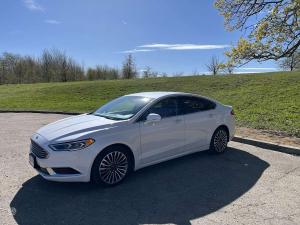 White Ford Fusion 2018 in Kaunas, with an engine capacity of 2.00 L and mileage of 96 thousand km for 10990 €, photo 4 on AUTOMOTO.COM.LV