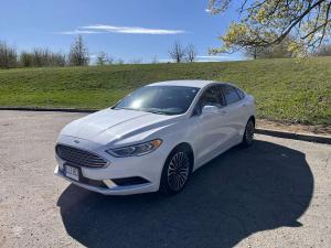 White Ford Fusion 2018 in Kaunas, with an engine capacity of 2.00 L and mileage of 96 thousand km for 10990 €, photo 5 on AUTOMOTO.COM.LV