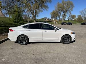 White Ford Fusion 2018 in Kaunas, with an engine capacity of 2.00 L and mileage of 96 thousand km for 10990 €, photo 8 on AUTOMOTO.COM.LV