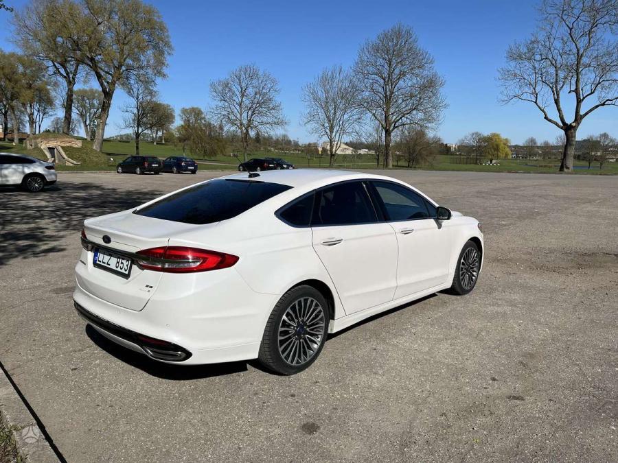 White Ford Fusion 2018 in Kaunas, with an engine capacity of 2.00 L and mileage of 96 thousand km for 10990 €, photo 10 on AUTOMOTO.COM.LV