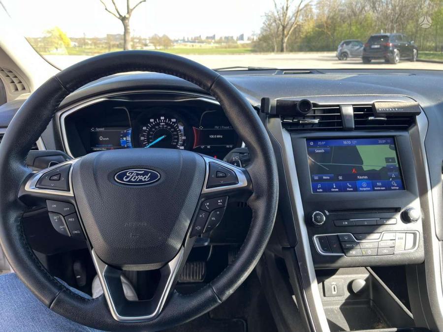 White Ford Fusion 2018 in Kaunas, with an engine capacity of 2.00 L and mileage of 96 thousand km for 10990 €, photo 12 on AUTOMOTO.COM.LV