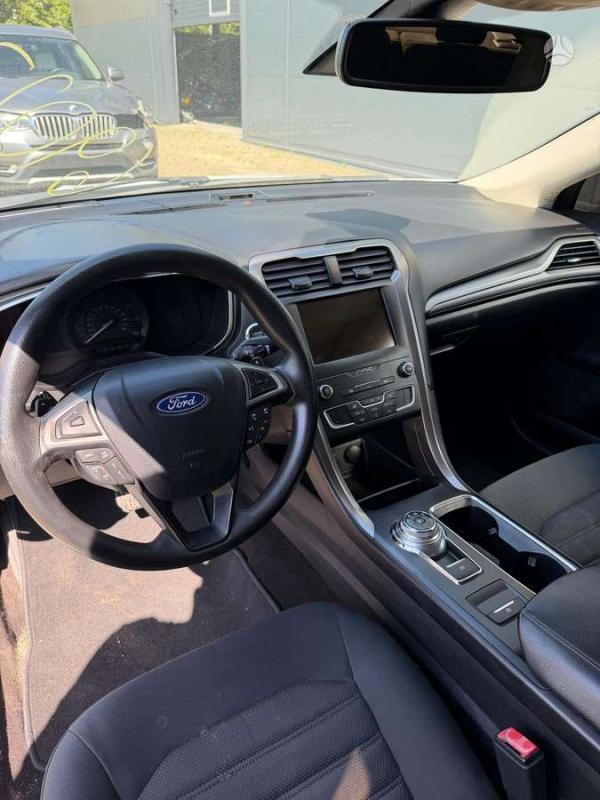 White Ford Fusion 2019 in Klaipeda, with an engine capacity of 1.50 L and mileage of 190 thousand km for 4900 €, photo 6 on AUTOMOTO.COM.LV