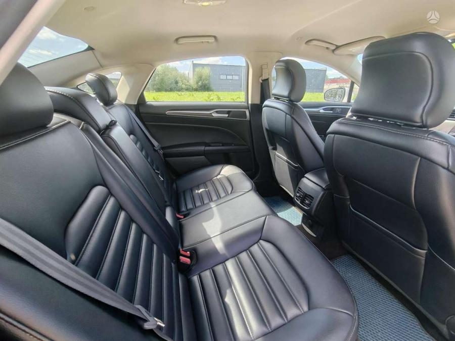White Ford Fusion 2019 in Kaunas, with an engine capacity of 2.00 L and mileage of 102 thousand km for 9500 €, photo 8 on AUTOMOTO.COM.LV