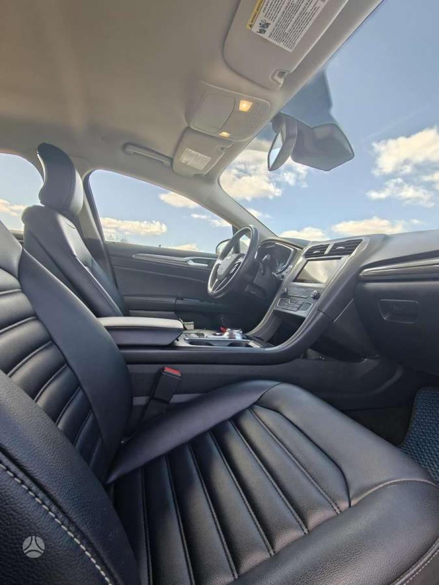 White Ford Fusion 2019 in Kaunas, with an engine capacity of 2.00 L and mileage of 102 thousand km for 9500 €, photo 9 on AUTOMOTO.COM.LV