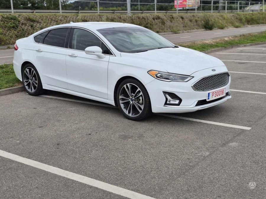 White Ford Fusion 2019 in Vilnius, with an engine capacity of 2.00 L and mileage of 158 thousand km for 11300 €, photo 4 on AUTOMOTO.COM.LV