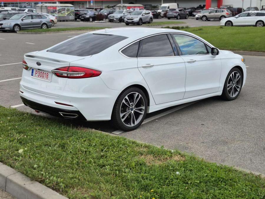 White Ford Fusion 2019 in Vilnius, with an engine capacity of 2.00 L and mileage of 158 thousand km for 11300 €, photo 5 on AUTOMOTO.COM.LV