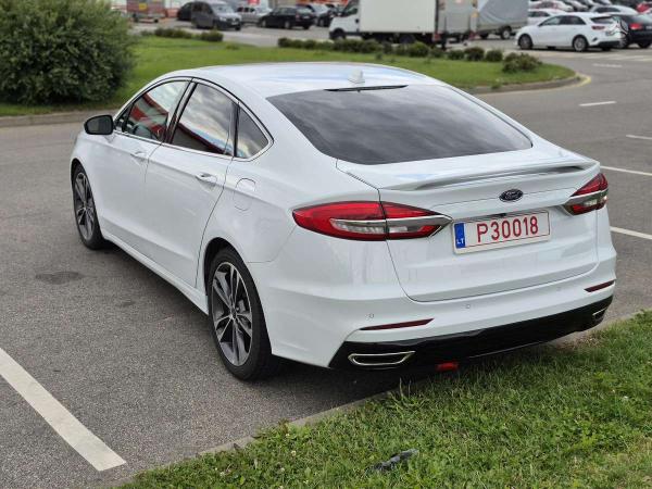 White Ford Fusion 2019 in Vilnius, with an engine capacity of 2.00 L and mileage of 158 thousand km for 11300 €, photo 6 on AUTOMOTO.COM.LV