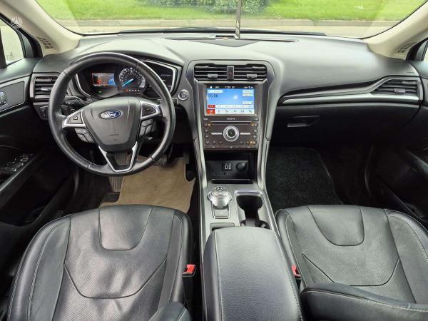 White Ford Fusion 2019 in Vilnius, with an engine capacity of 2.00 L and mileage of 158 thousand km for 11300 €, photo 9 on AUTOMOTO.COM.LV