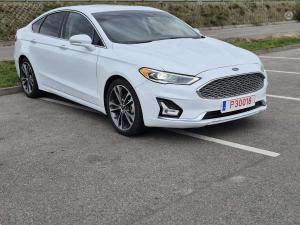 White Ford Fusion 2019 in Vilnius, with an engine capacity of 2.00 L and mileage of 158 thousand km for 11300 €, photo 18 on AUTOMOTO.COM.LV