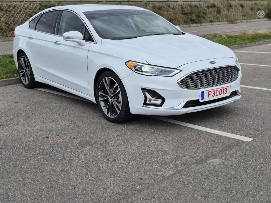 White Ford Fusion 2019 in Vilnius, with an engine capacity of 2.00 L and mileage of 158 thousand km for 11300 €, photo 18 on AUTOMOTO.COM.LV