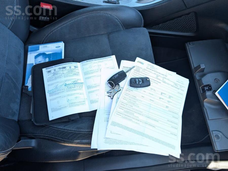 Black Ford Galaxy 2010 in Riga, with an engine capacity of 2.00 L and mileage of 220 thousand km for 5450 €, photo 26 on AUTOMOTO.COM.LV