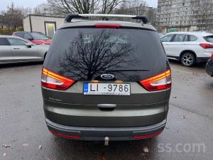 Brown Ford Galaxy 2012 in Riga, with an engine capacity of 2.00 L and mileage of 317 thousand km for 5950 €, photo 5 on AUTOMOTO.COM.LV