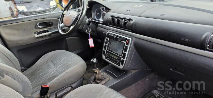 Pelēks Ford Galaxy 2003 Valmiera, ar dzinēja tilpumu 1.90 L un nobraukumu 338 tūkst. km par 950 €, foto 10 vietnē AUTOMOTO.COM.LV