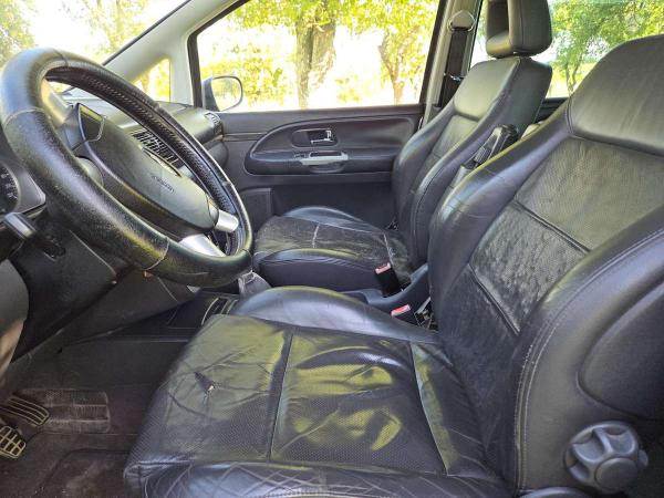 Pelēks Ford Galaxy 2004 Alīta, ar dzinēja tilpumu 1.90 L un nobraukumu 340 tūkst. km par 1299 €, foto 6 vietnē AUTOMOTO.COM.LV
