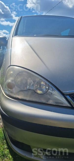 Pelēks Ford Galaxy 2005 Jelgava, ar dzinēja tilpumu 1.90 L un nobraukumu 370 tūkst. km par 800 €, foto 12 vietnē AUTOMOTO.COM.LV