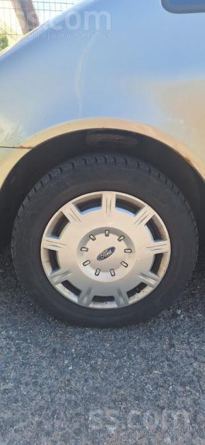 Pelēks Ford Galaxy 2005 Jelgava, ar dzinēja tilpumu 1.90 L un nobraukumu 370 tūkst. km par 800 €, foto 15 vietnē AUTOMOTO.COM.LV