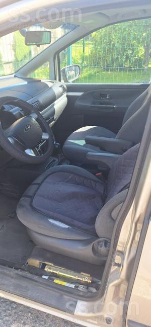 Pelēks Ford Galaxy 2005 Jelgava, ar dzinēja tilpumu 1.90 L un nobraukumu 370 tūkst. km par 800 €, foto 17 vietnē AUTOMOTO.COM.LV