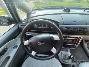 Pelēks Ford Galaxy 2005 Rēzekne, ar dzinēja tilpumu 1.90 L un nobraukumu 353 tūkst. km par 1630 €, foto 9 vietnē AUTOMOTO.COM.LV