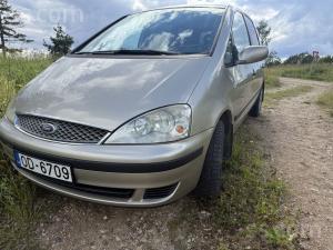 Pelēks Ford Galaxy 2005 Rēzekne, ar dzinēja tilpumu 1.90 L un nobraukumu 353 tūkst. km par 1630 €, foto 19 vietnē AUTOMOTO.COM.LV