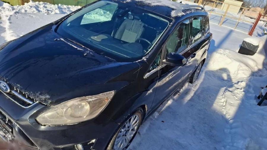 Black Ford Grand C-MAX 2011 in Vilnius, with an engine capacity of 2.00 L and mileage of 245 thousand km for 3140 €, photo 4 on AUTOMOTO.COM.LV