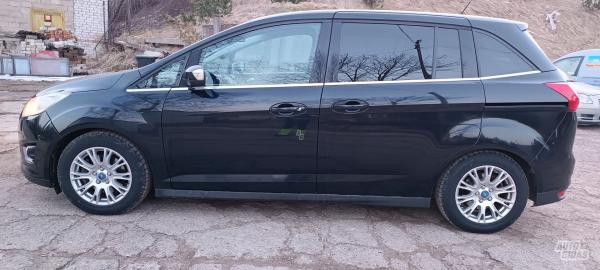 Black Ford Grand C-MAX 2011 in Plunge, with an engine capacity of 1.60 L and mileage of 260 thousand km for 3800 €, photo 7 on AUTOMOTO.COM.LV