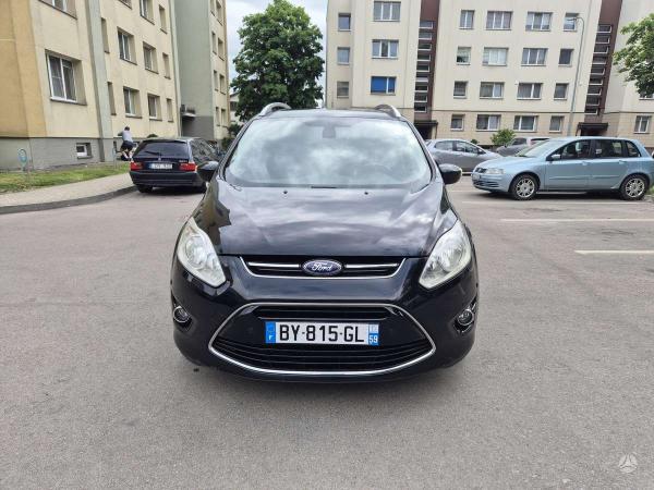 Black Ford Grand C-MAX 2011 in Taurage, with an engine capacity of 1.56 L and mileage of 165 thousand km for 3999 €, photo 1 on AUTOMOTO.COM.LV