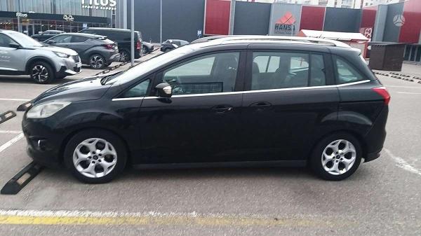 Black Ford Grand C-MAX 2011 in Vilnius, with an engine capacity of 2.00 L and mileage of 310 thousand km for 3230 €, photo 8 on AUTOMOTO.COM.LV