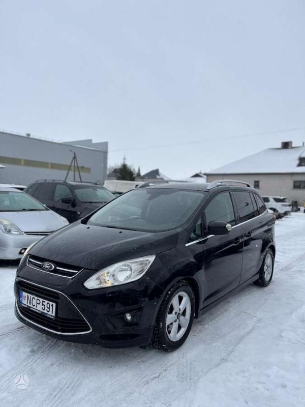 Black Ford Grand C-MAX 2013 in Marijampole, with an engine capacity of 2.00 L and mileage of 196 thousand km for 5100 €, photo 5 on AUTOMOTO.COM.LV