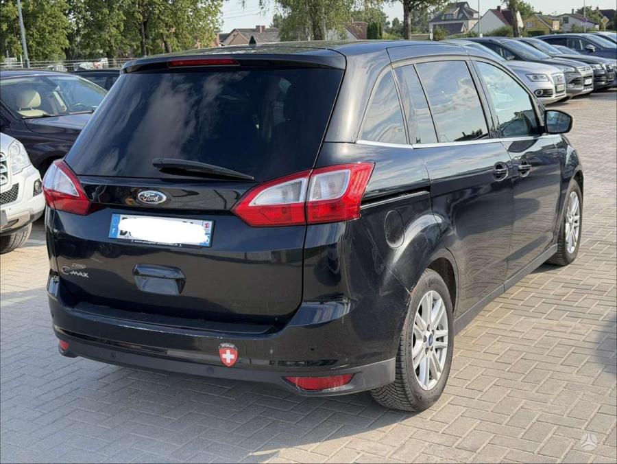 Black Ford Grand C-MAX 2014 in Taurage, with an engine capacity of 1.56 L and mileage of 303 thousand km for 3100 €, photo 4 on AUTOMOTO.COM.LV