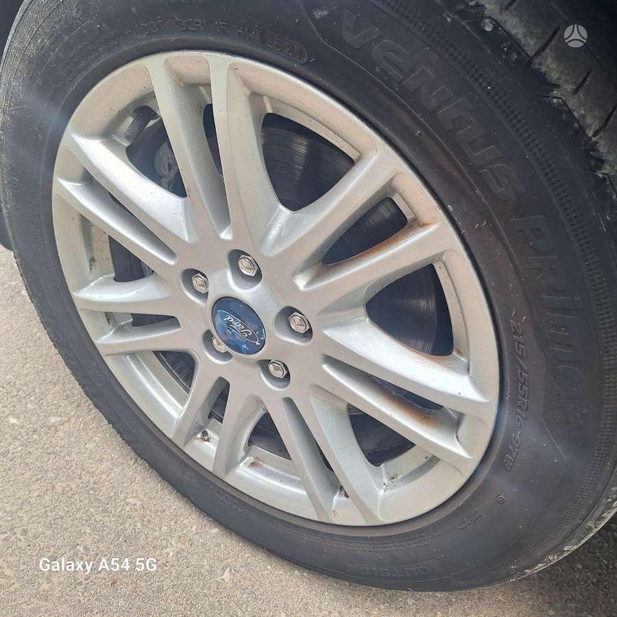 Black Ford Grand C-MAX 2014 in Taurage, with an engine capacity of 1.56 L and mileage of 201 thousand km for 4999 €, photo 15 on AUTOMOTO.COM.LV