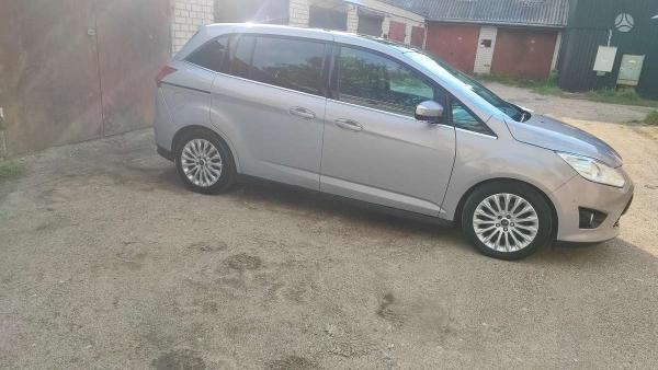 Grey Ford Grand C-MAX 2011 in Prienai, with an engine capacity of 1.56 L and mileage of 270 thousand km for 3790 €, photo 5 on AUTOMOTO.COM.LV