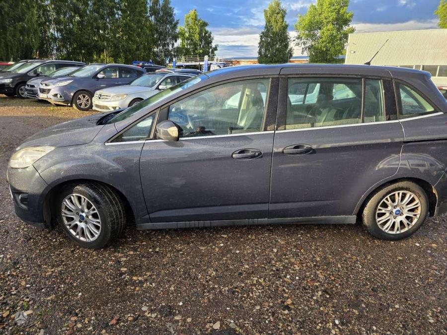 Grey Ford Grand C-MAX 2011 in Ukmerge, with an engine capacity of 1.56 L and mileage of 238 thousand km for 2850 €, photo 5 on AUTOMOTO.COM.LV