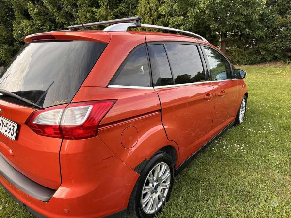Red Ford Grand C-MAX 2011 in Raseiniai, with an engine capacity of 1.56 L and mileage of 259 thousand km for 2500 €, photo 6 on AUTOMOTO.COM.LV