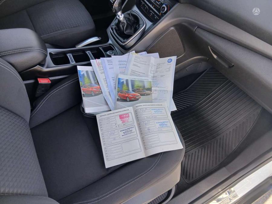 White Ford Grand C-MAX 2015 in Marijampole, with an engine capacity of 1.00 L and mileage of 129 thousand km for 5450 €, photo 35 on AUTOMOTO.COM.LV