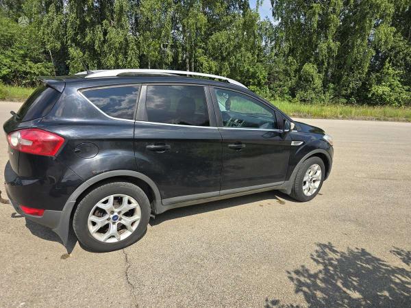 Black Ford Kuga 2008 in Panevezys, with an engine capacity of 2.00 L and mileage of 254 thousand km for 3600 €, photo 4 on AUTOMOTO.COM.LV